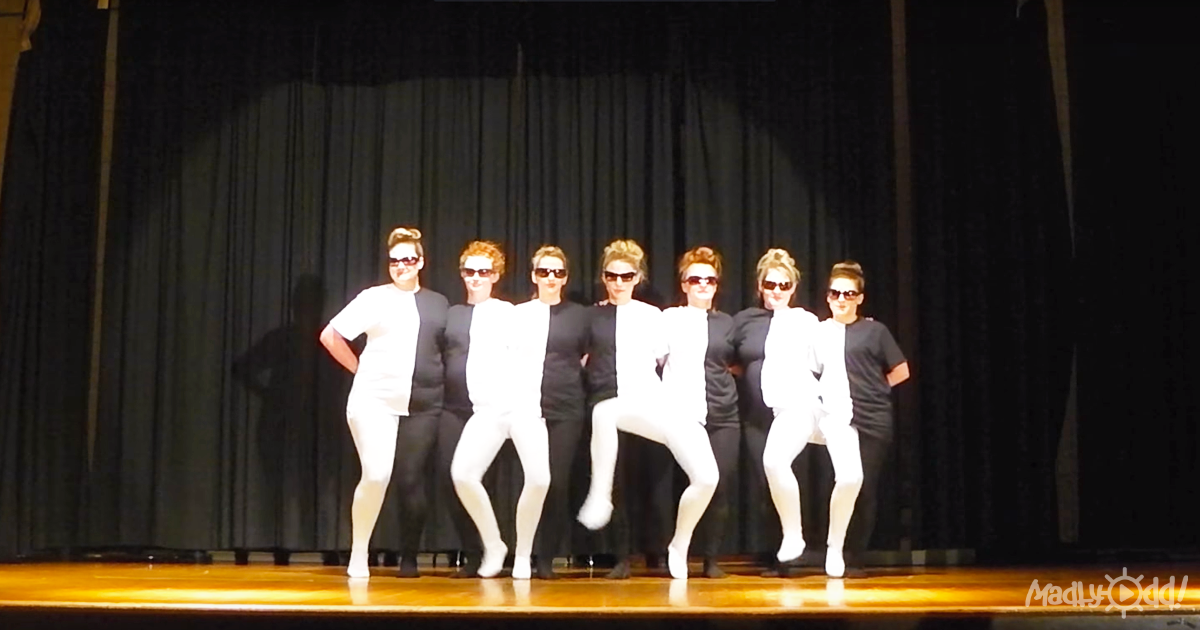 7 women line up on stage and make the crowd roar with their unique routine!