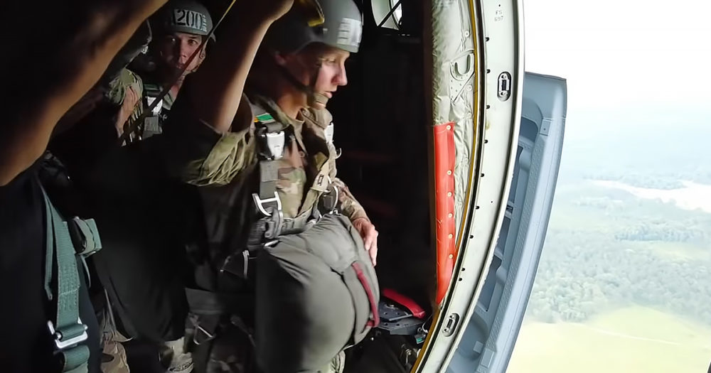Before they graduate, soldiers jump out of a plane with a parachute ...