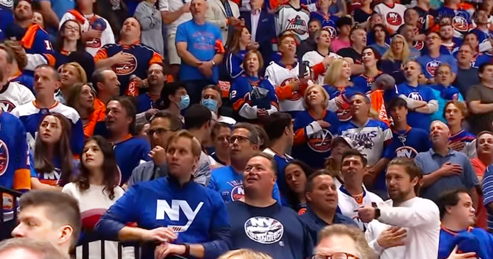 A choir of 13,917 hockey fans gives an outstanding performance of the ...