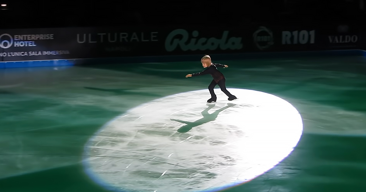 Young boy glides over ice in show-stopping ice-skating routine