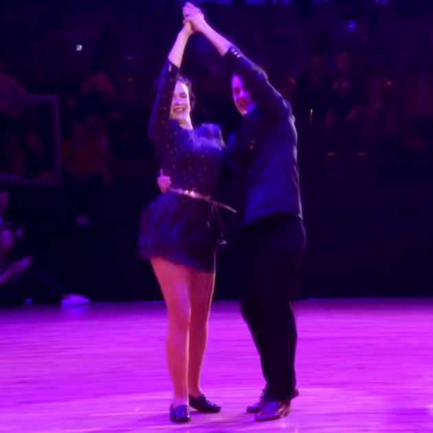 Couples perform incredible boogie-woogie dance to hit rock and roll ...