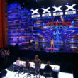 AGT singer climbs on judges' table in incredible shock rock performance