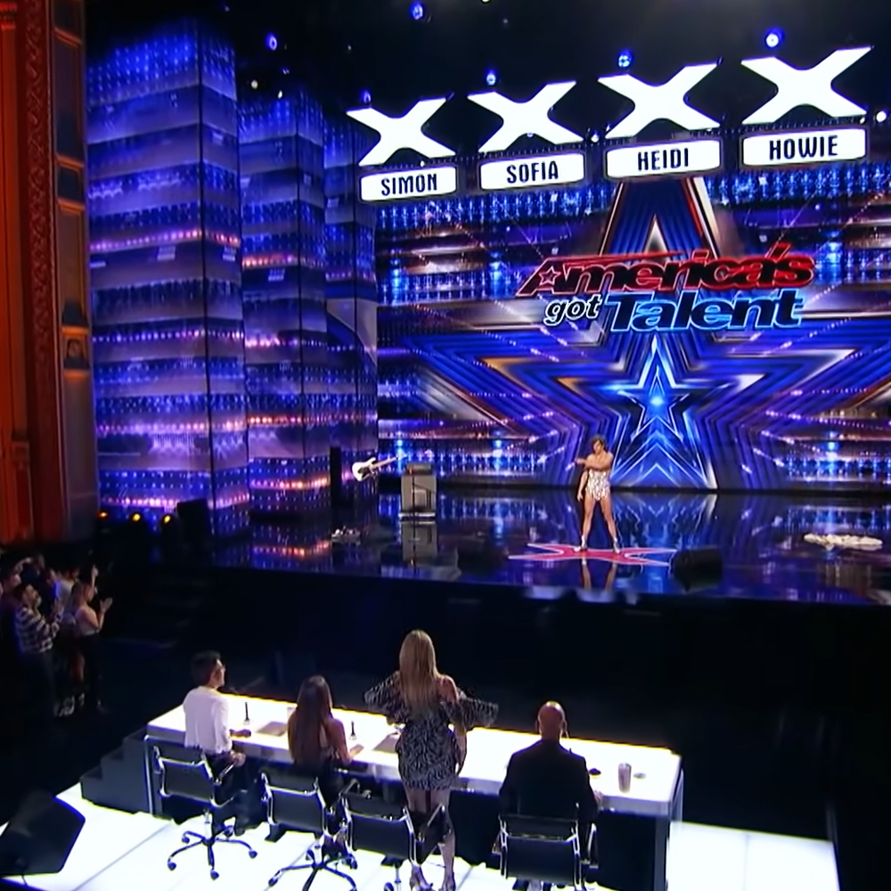 AGT singer climbs on judges' table in incredible shock rock performance