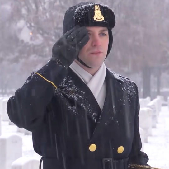 U.S. Army bugler performs “Taps” at Arlington Cemetery in the snow ...