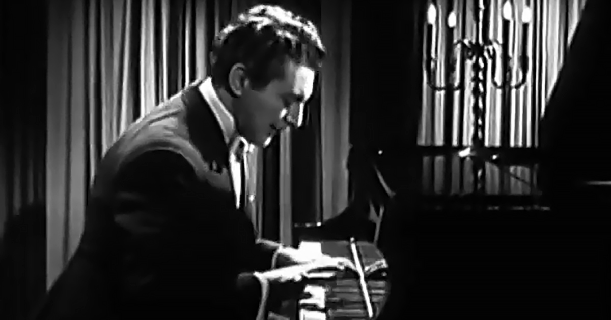 A very young Liberace delights his TV viewers with an Italian medley ...