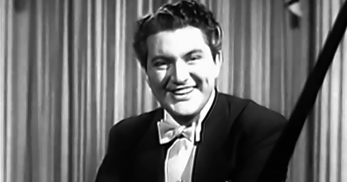 A very young Liberace delights his TV viewers with an Italian medley ...