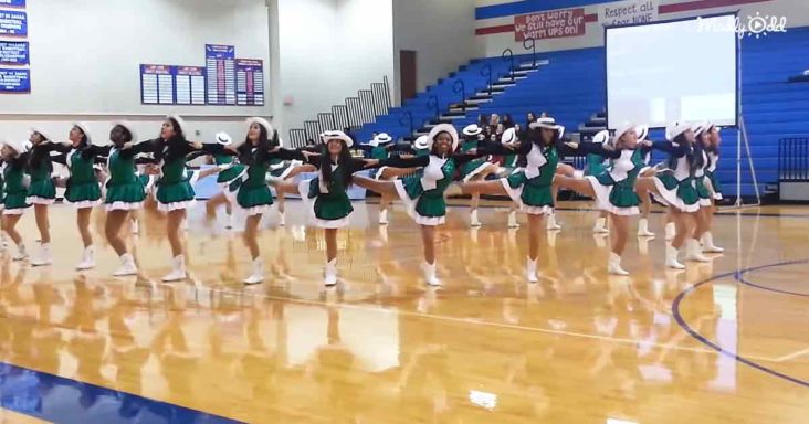 High kick dance routine by high school group like ‘The Rockettes’