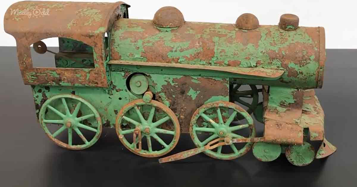 Antique toy train from the 1920s restored to look new