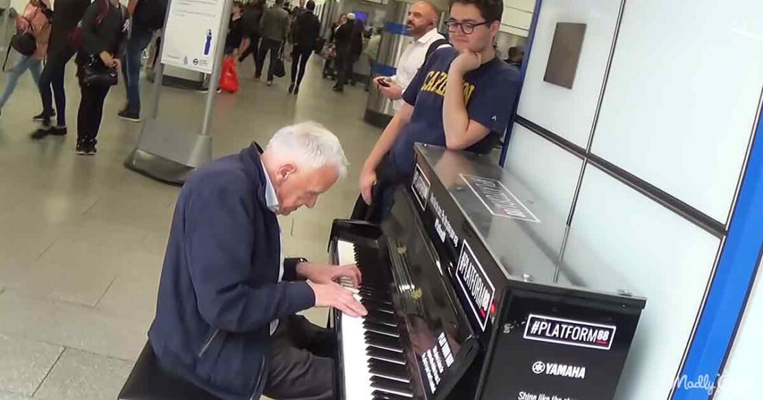 Senior man plays piano and gets a secret visit from boogie-woogie master