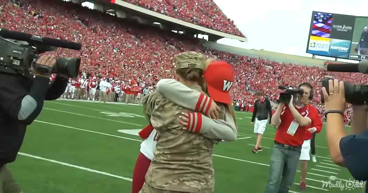 Soldier mom returns to surprise daughter at a Wisconsin football game ...